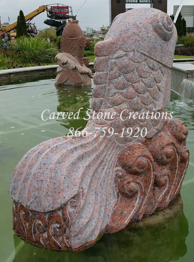 Spitting gold fish fountain - Carved Stone Creations
